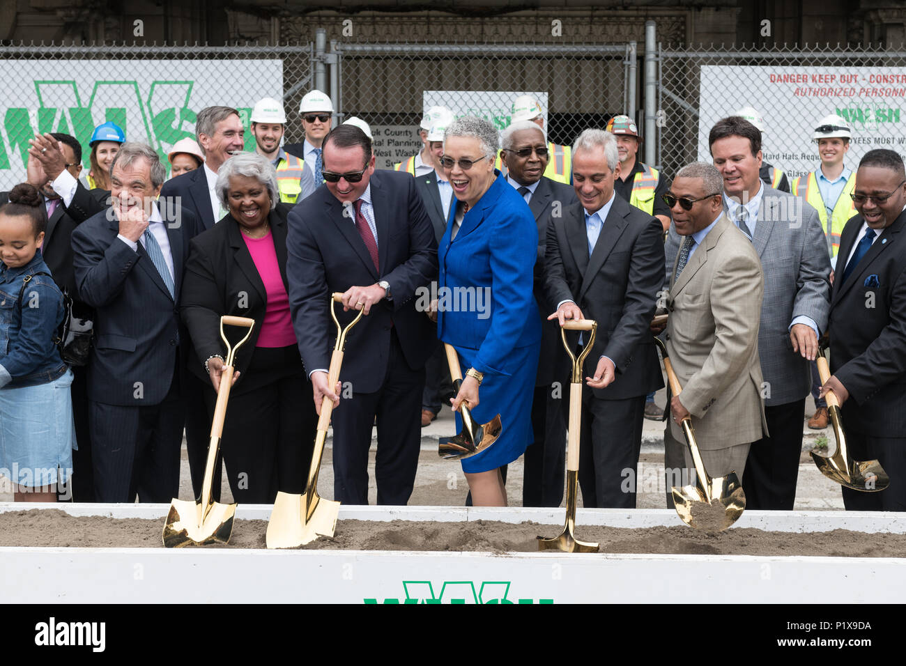 Attendees at the groundbreaking ceremony for the redevelopment of Cook ...