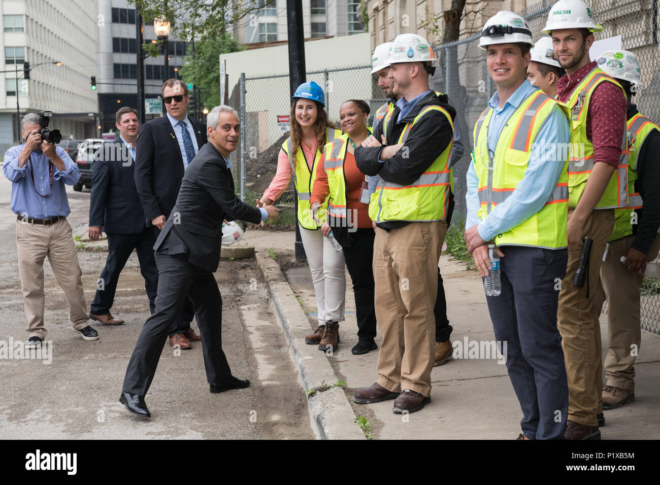 Mayor Rahm Emanuel greets workers at the groundbreaking ceremony for ...