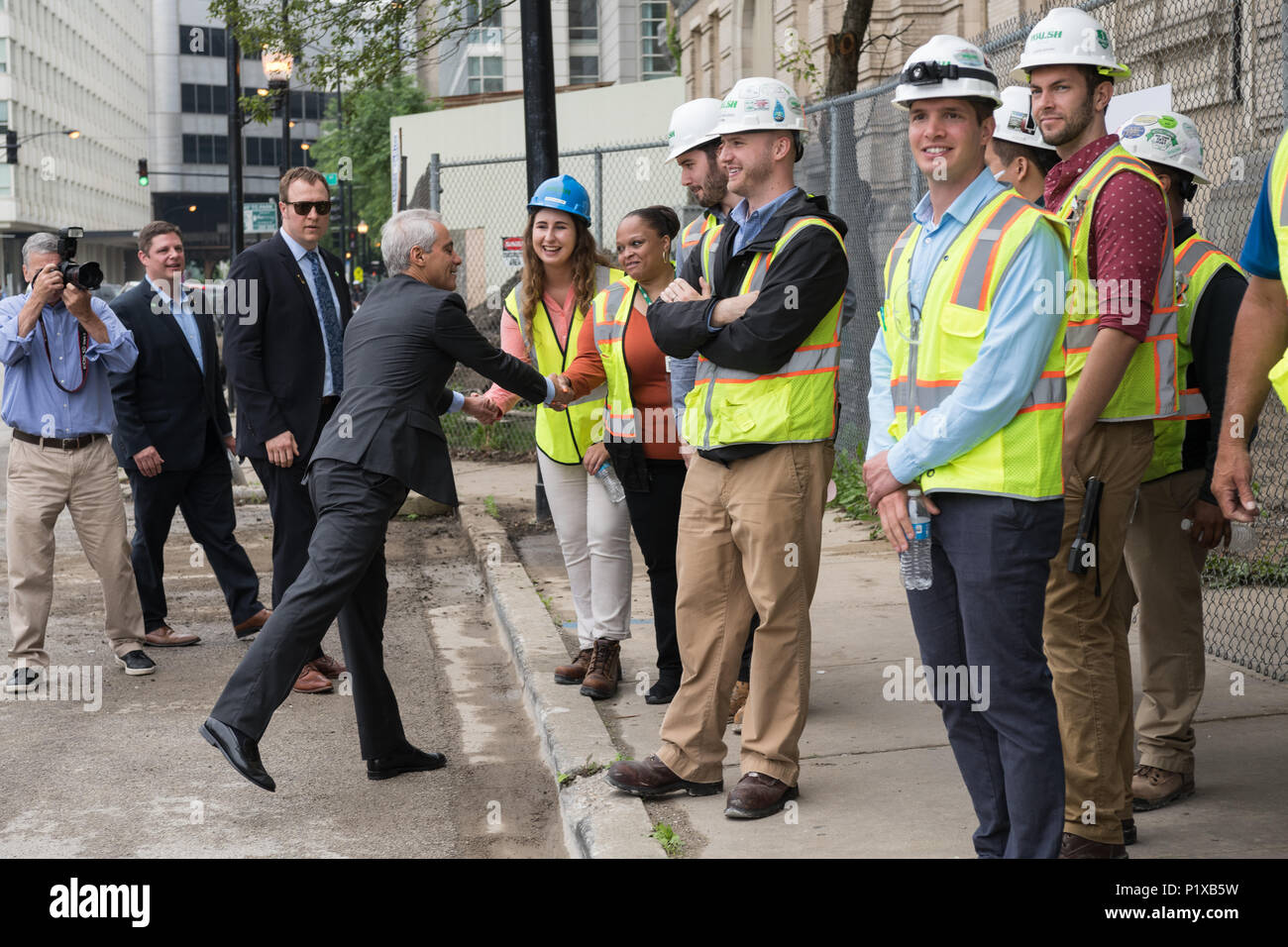 Mayor Rahm Emanuel greets workers at the groundbreaking ceremony for ...