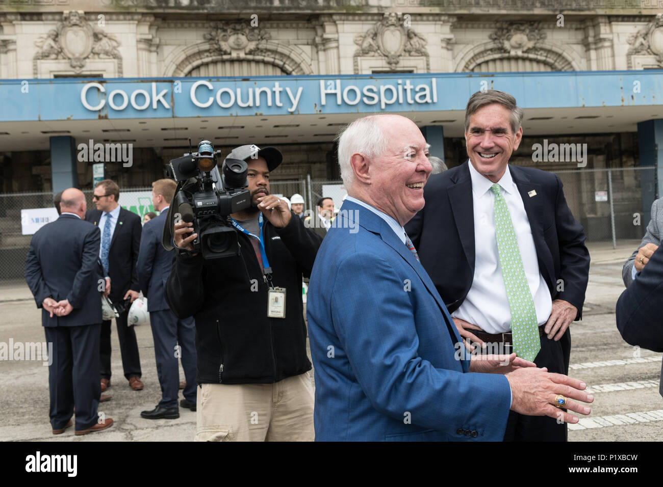 Attendees at the groundbreaking ceremony for the redevelopment of Cook ...