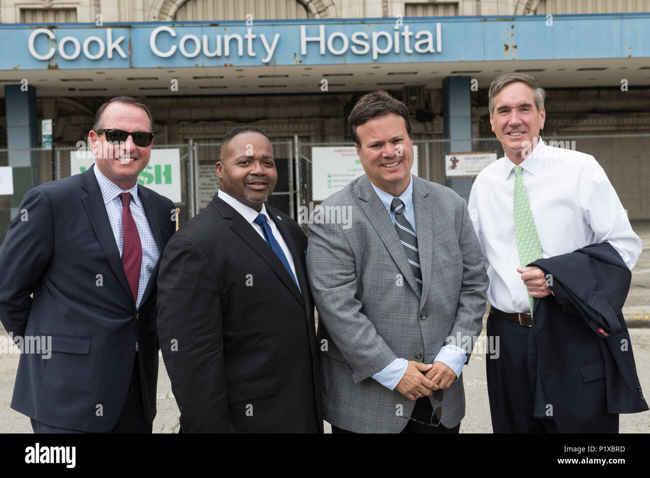 Attendees at the groundbreaking ceremony for the redevelopment of Cook ...