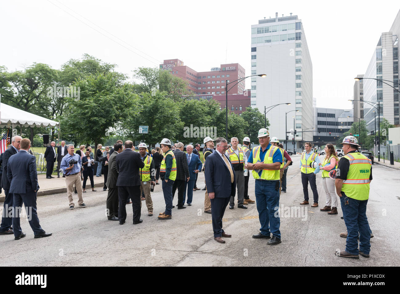 Attendees at the groundbreaking ceremony for the redevelopment of Cook ...