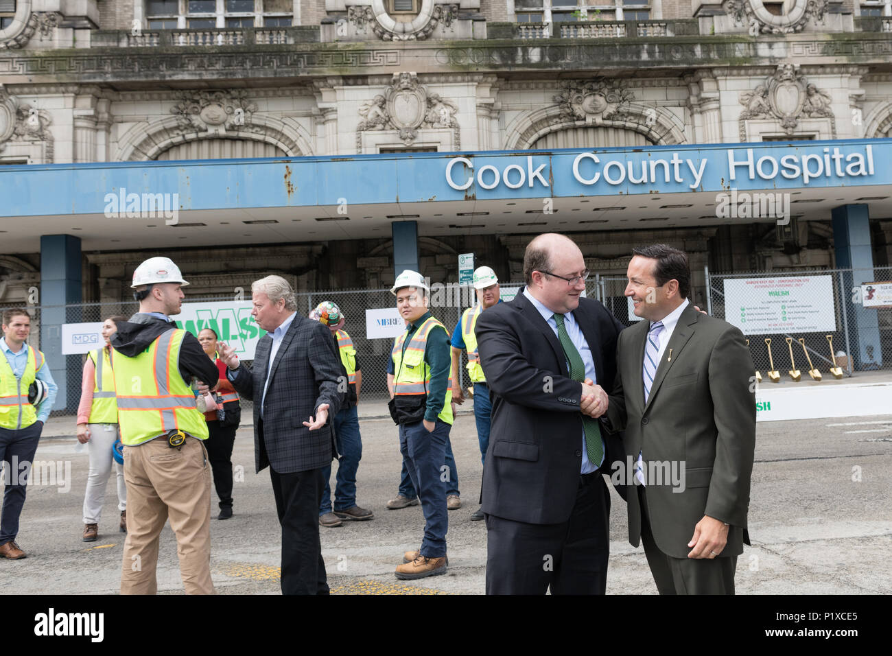 Attendees at the groundbreaking ceremony for the redevelopment of Cook ...