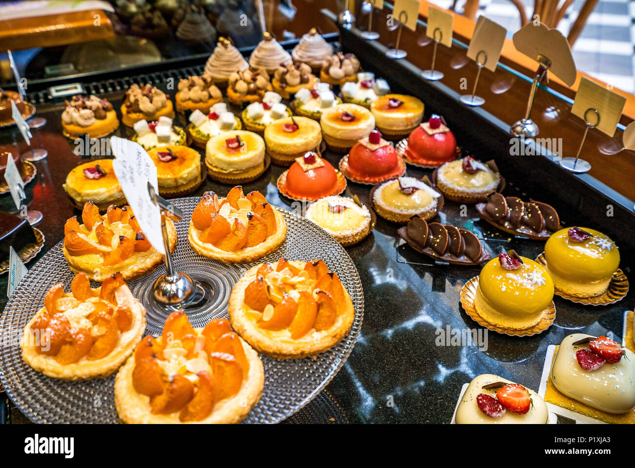 French pastries on display in a tea house, Le Valentin Jouffroy ...