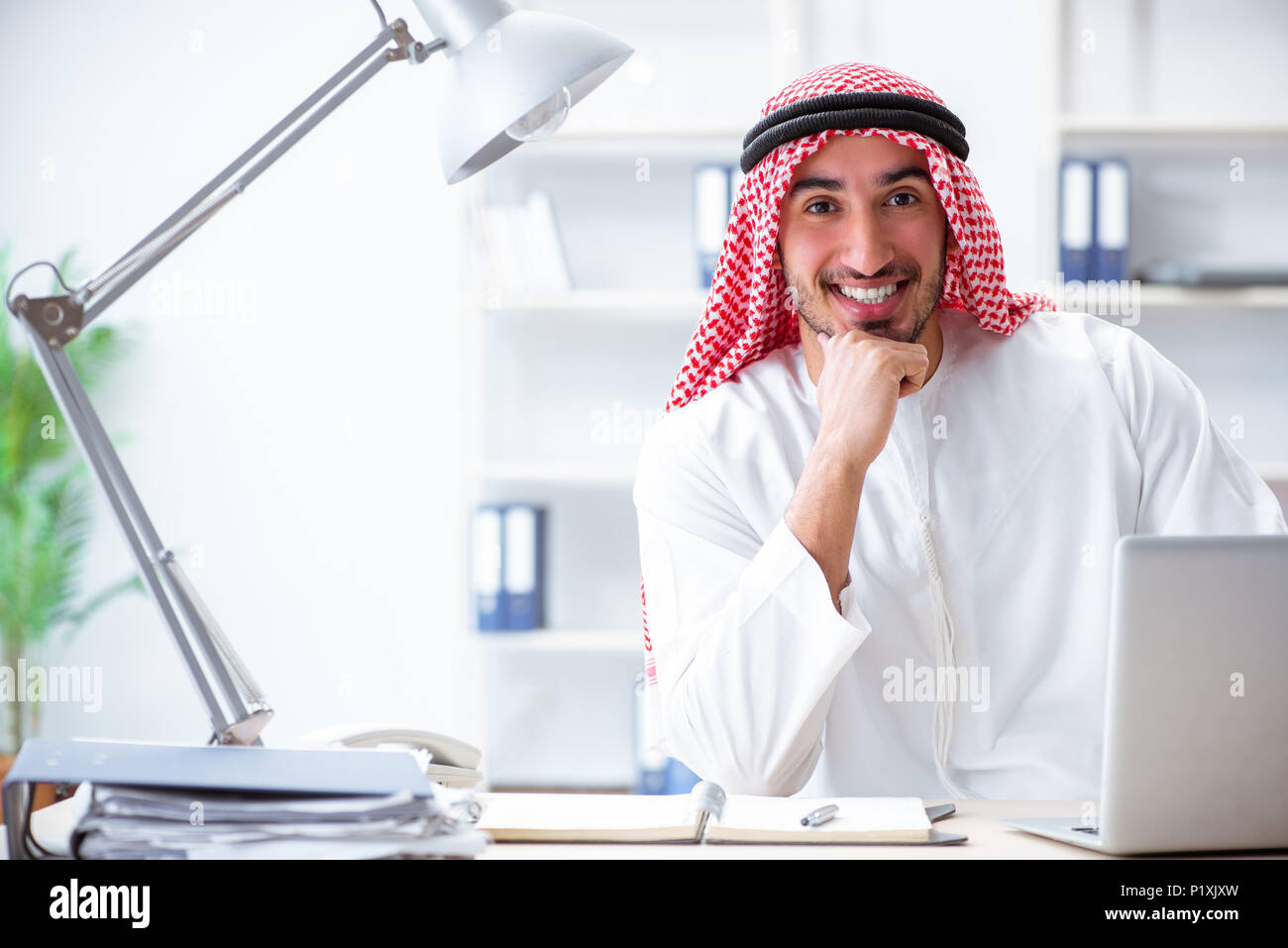 Arab businessman working in the office Stock Photo - Alamy