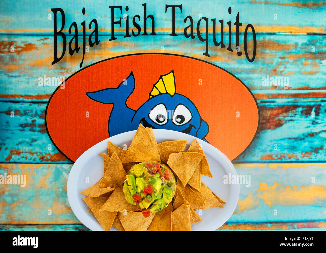 Guacamole with chips on a table at Baja Fish Taquito restaurant in San ...