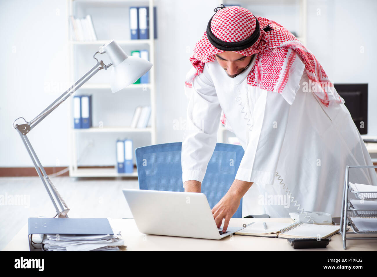 Arab businessman working in the office Stock Photo - Alamy