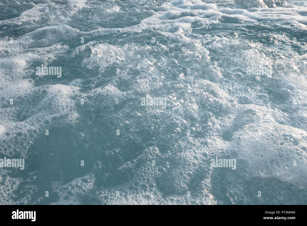 Blue clear frothy fresh Water in jacuzzi. Healthy lifestyle. Ideal for ...