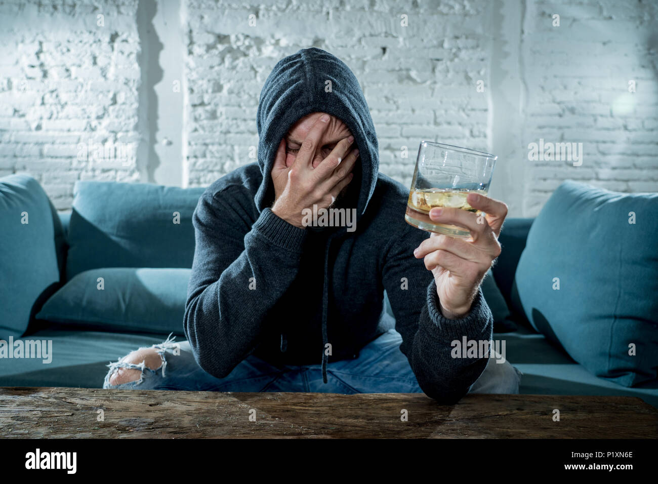 Alcoholic man sad hi-res stock photography and images - Alamy