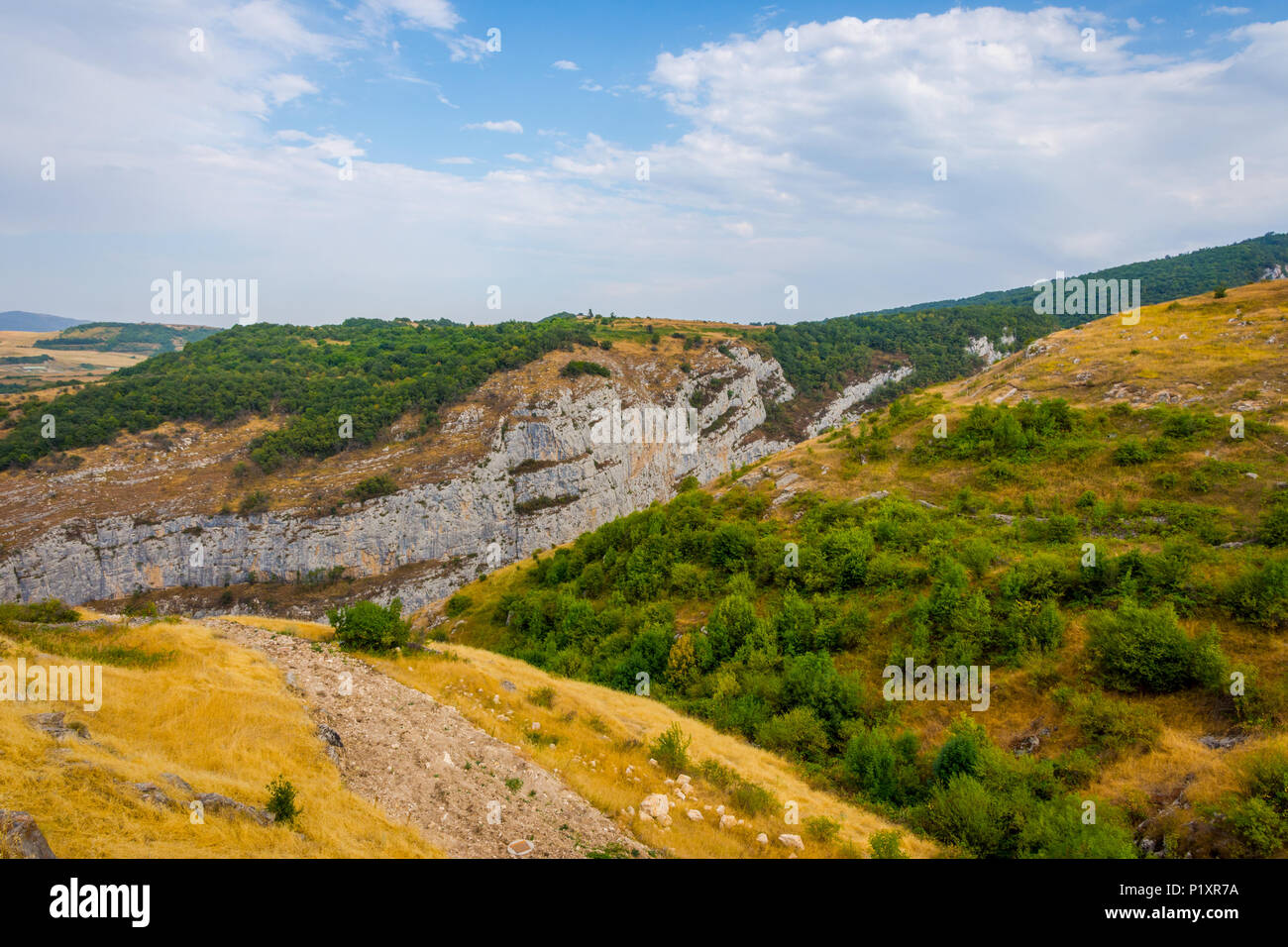 Golden summer landscape of hills and meadows in Nagorno Karabakh ...