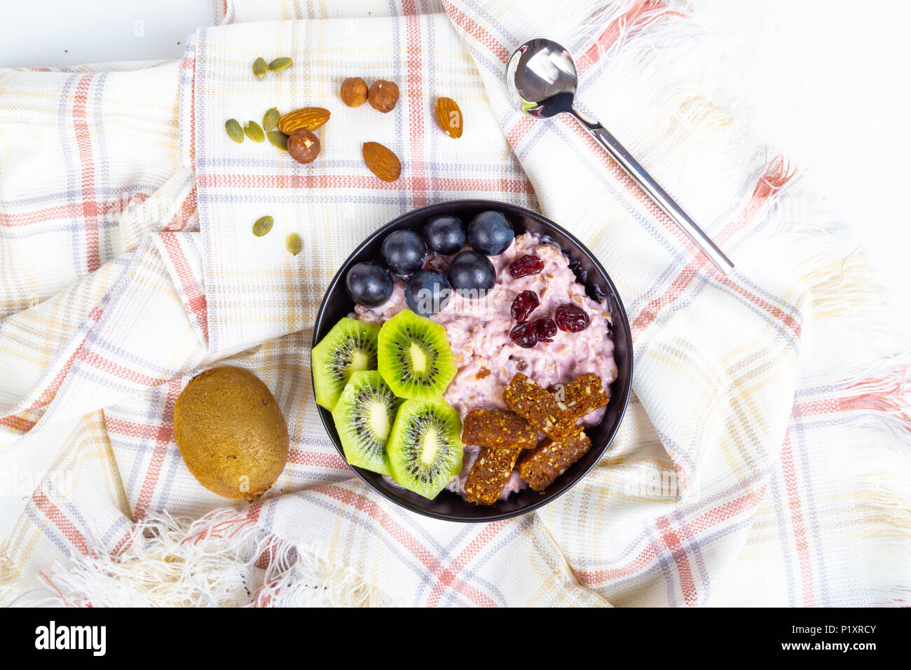 Healthy lifestyle, mix of energy fruits and dried nuts in cup ...