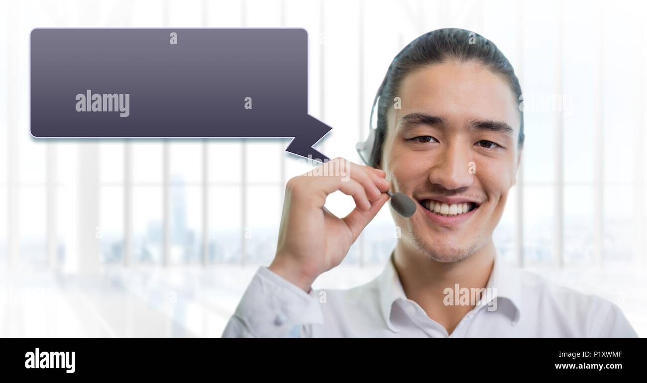 Customer service man with chat bubble Stock Photo - Alamy