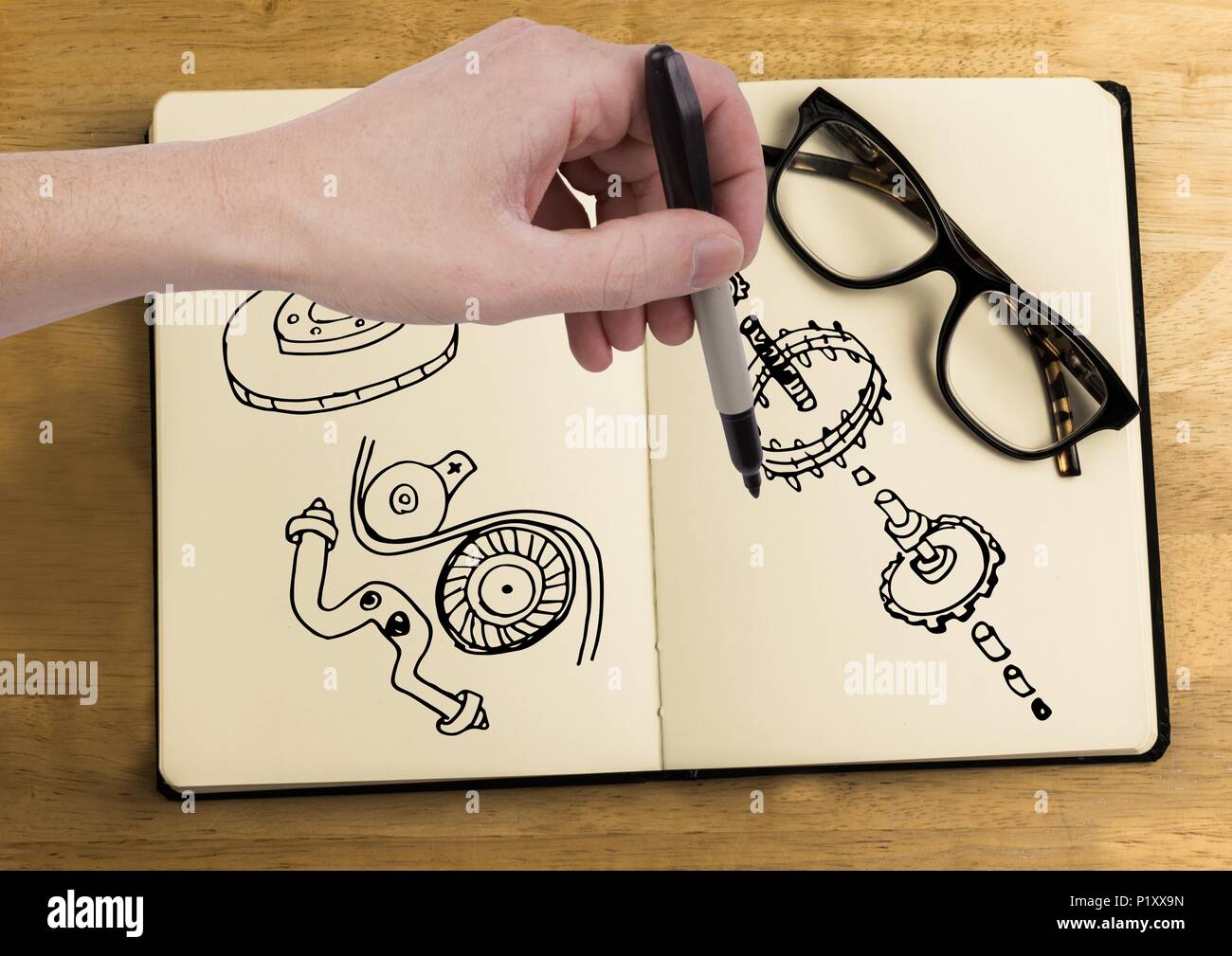 Sketch of mechanical elements and hand drawing Stock Photo - Alamy