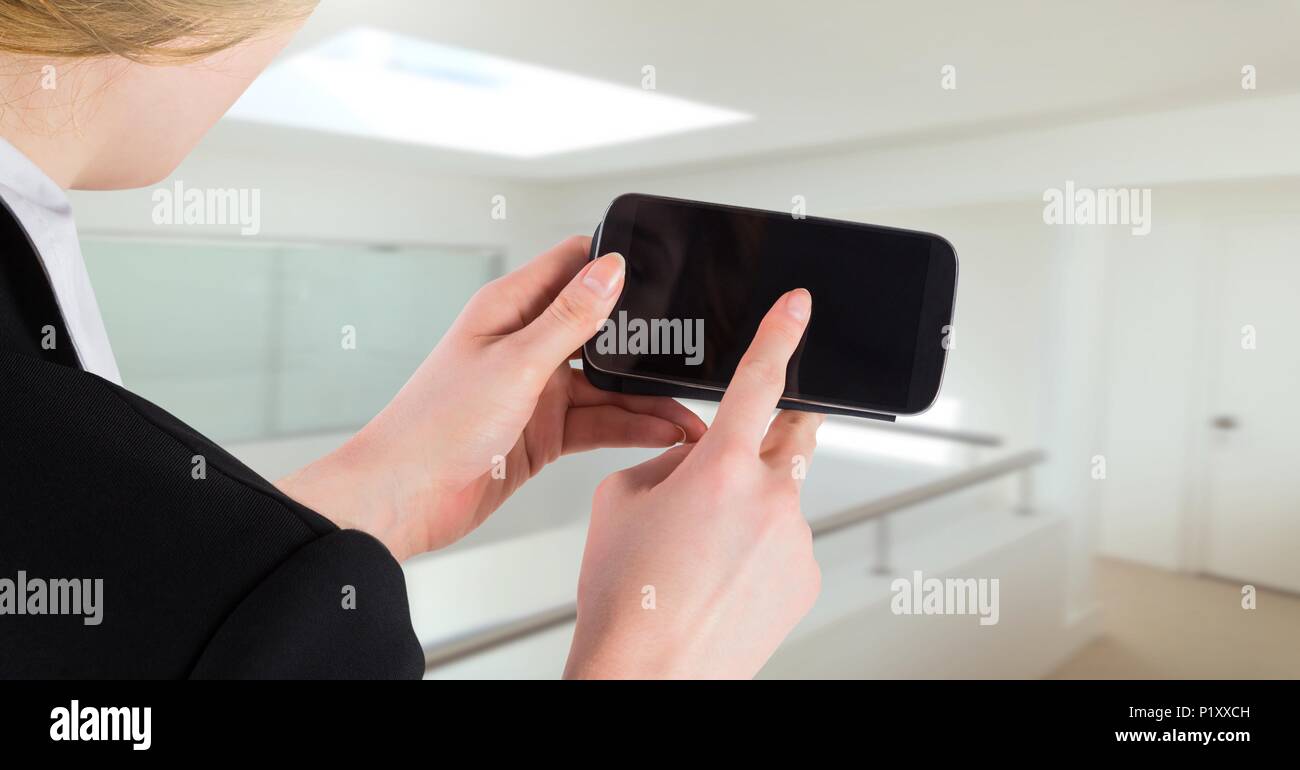 phone in hand at home Stock Photo - Alamy