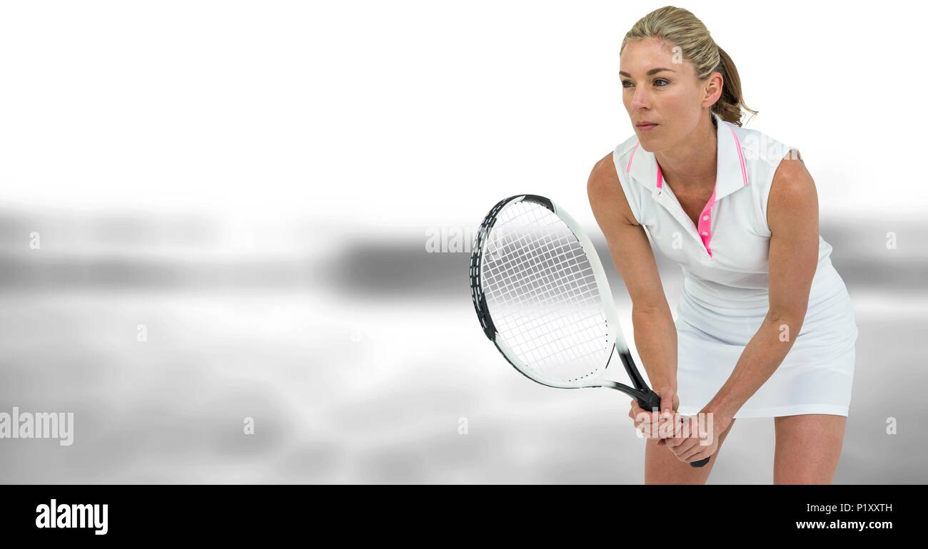 Tennis player woman with grey background with racket Stock Photo - Alamy