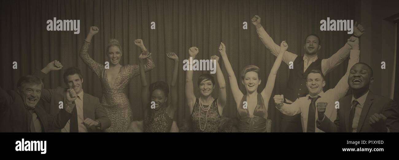 Group of people celebrating with joy at event Stock Photo - Alamy