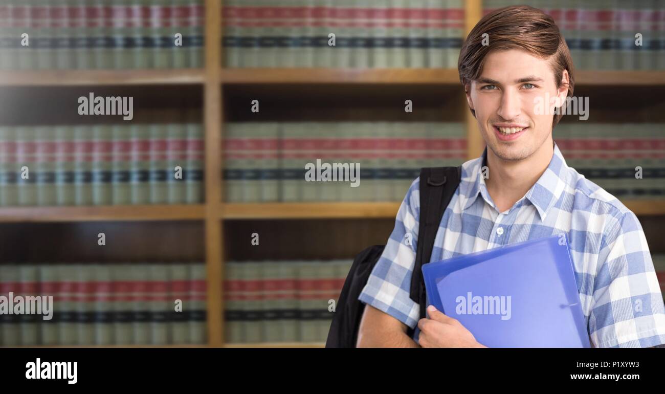 Student man in education library Stock Photo - Alamy