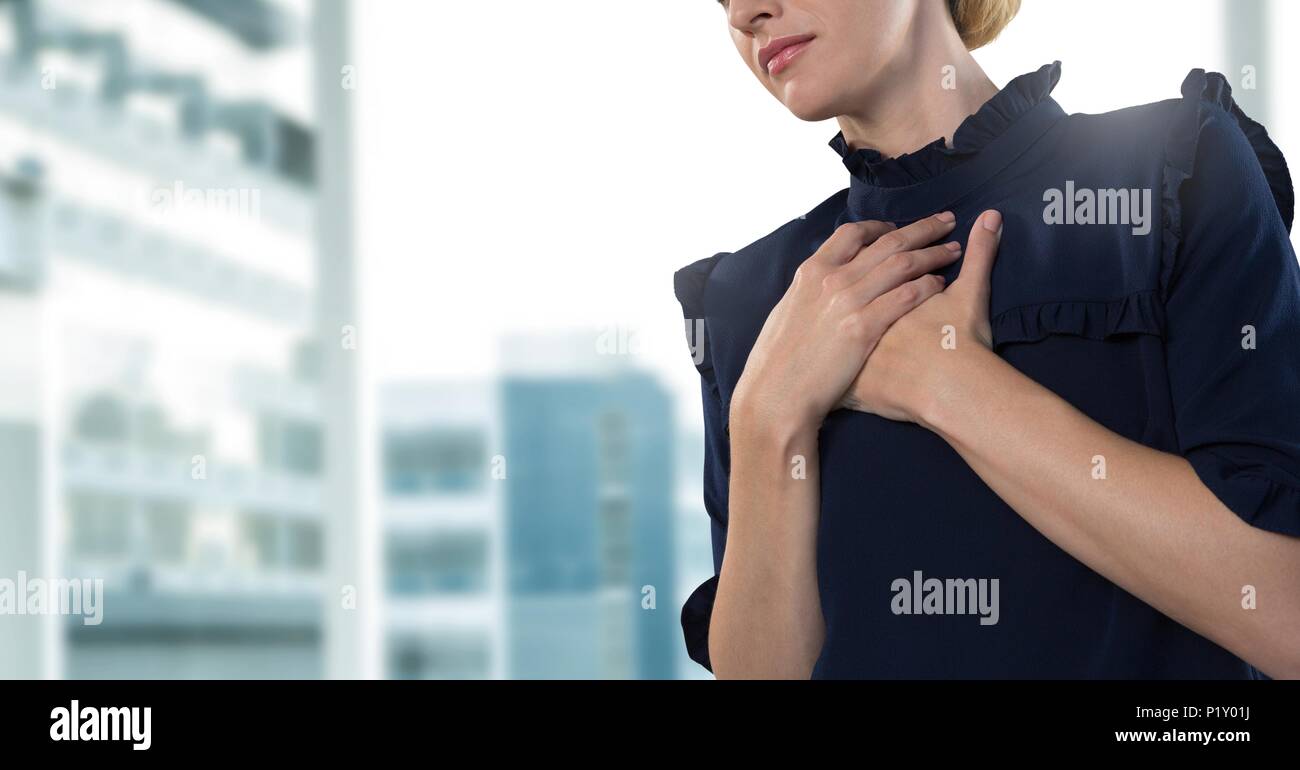 Woman holding laptop to chest hi-res stock photography and images - Alamy