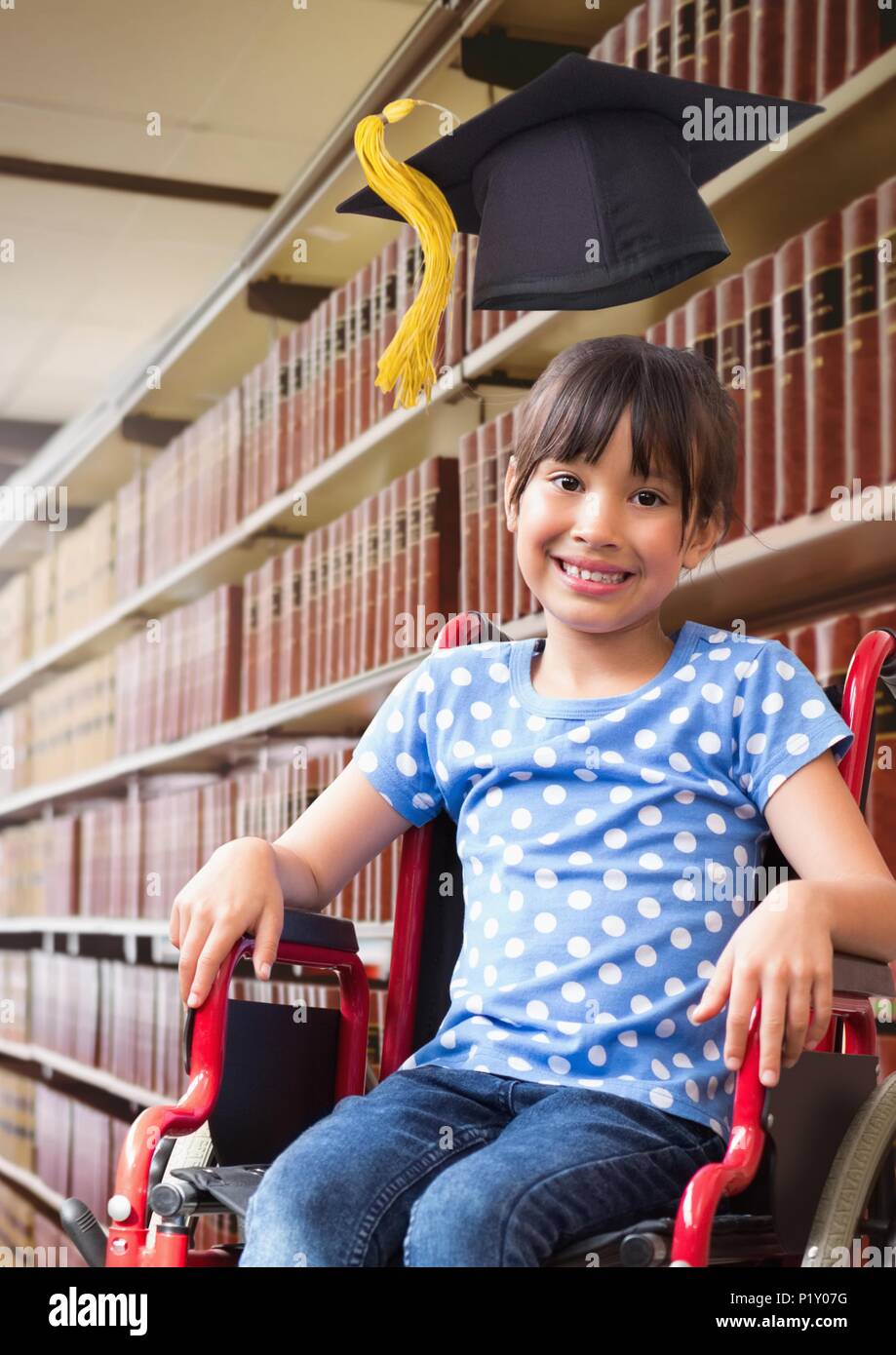 Disabled School girl in education library in wheelchair with graduation ...