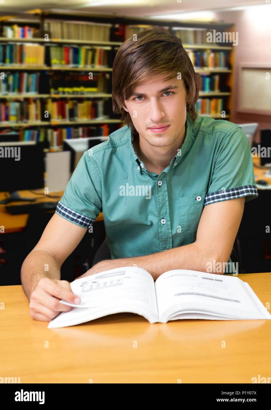 Student man in education library Stock Photo - Alamy