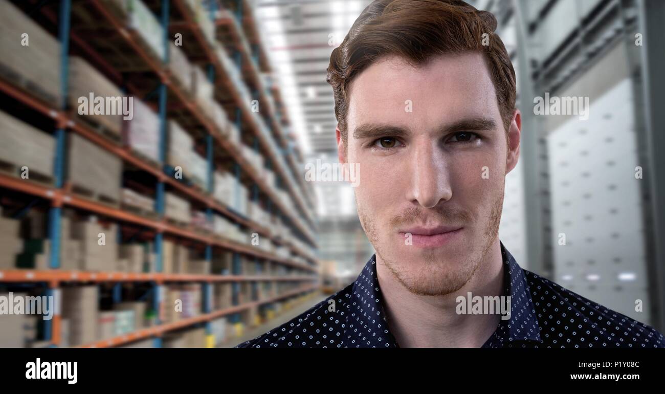 Businessman smiling in warehouse perspective Stock Photo - Alamy