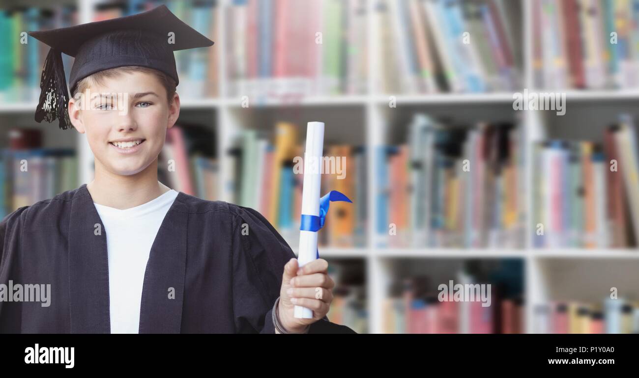 Student boy graduating in education library Stock Photo - Alamy