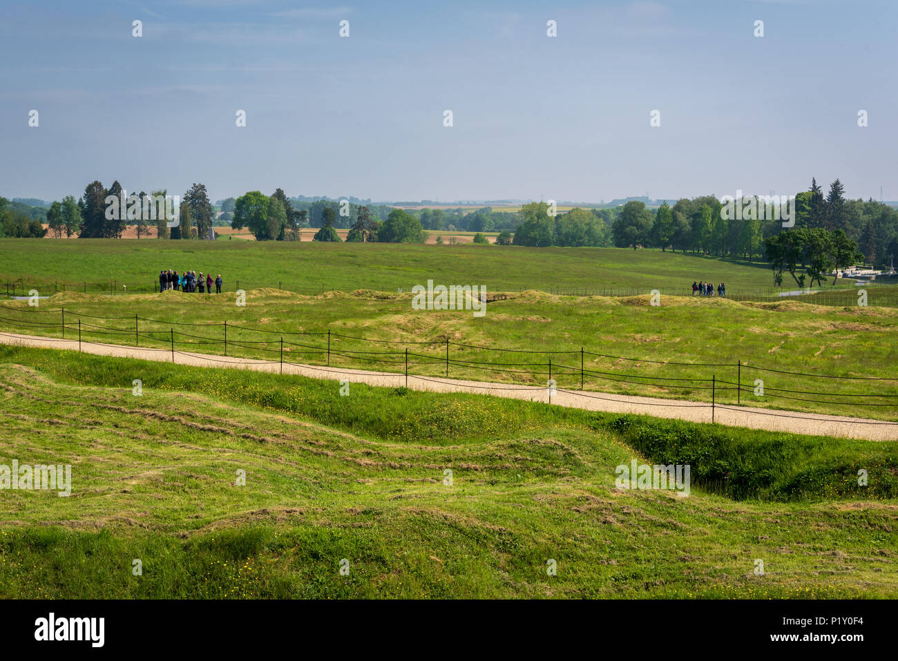 Visitors walking through preserved trench in Newfoundland Memorial Park ...
