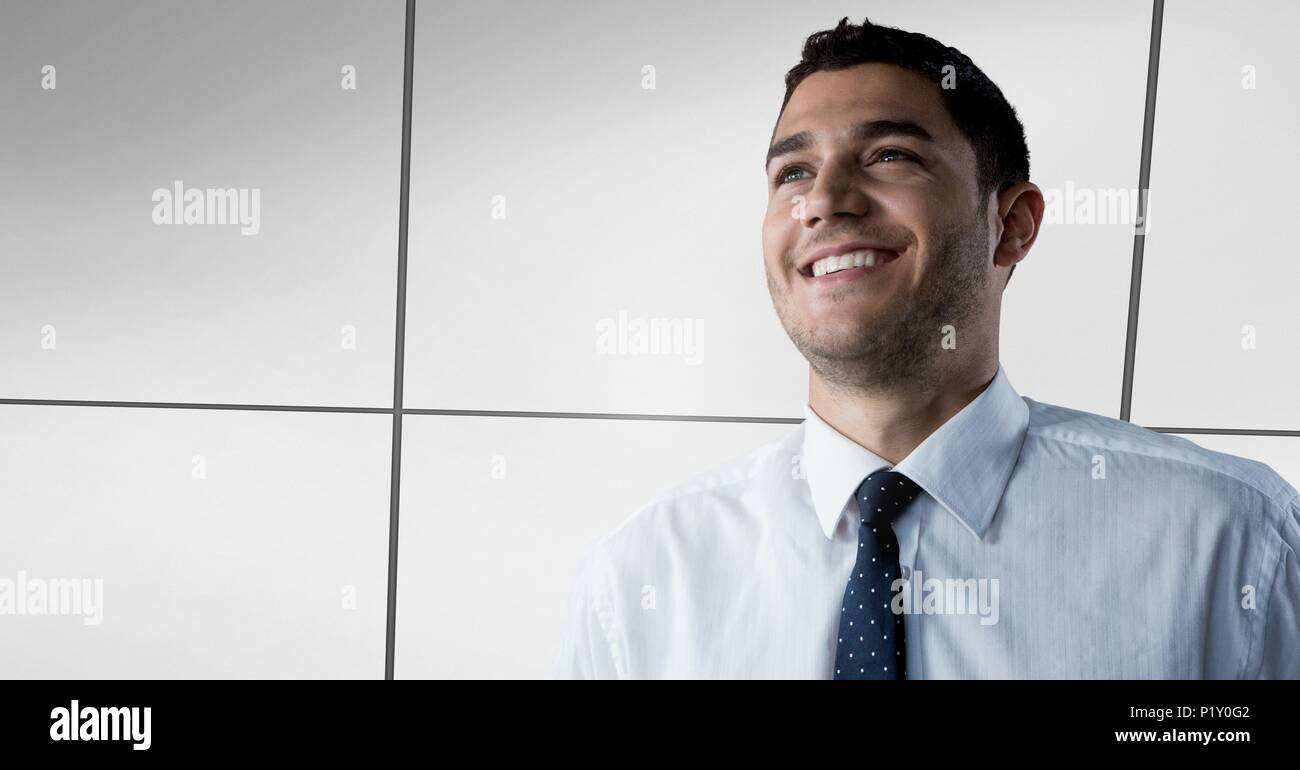 Businessman smiling successfully in warehouse perspective with lined ...