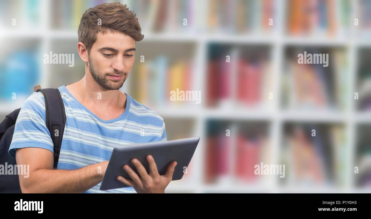 Student man in education library Stock Photo - Alamy