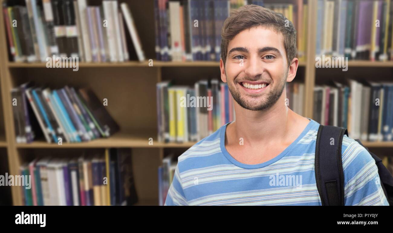 Student man in education library Stock Photo - Alamy