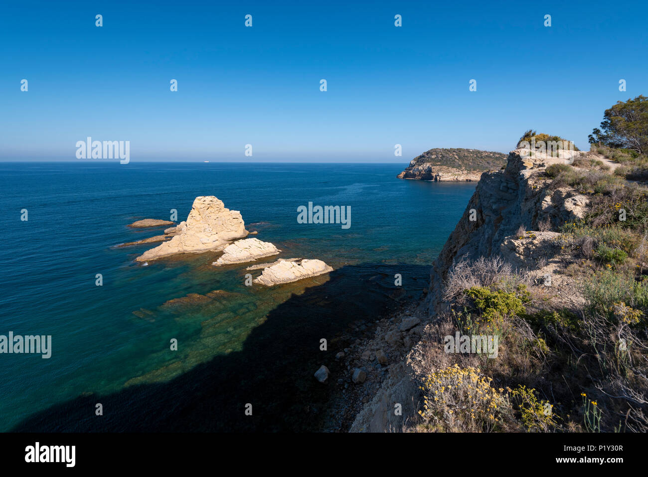 Rocky coast in Cap Prim and Portixol island, Javea, Alicante province ...