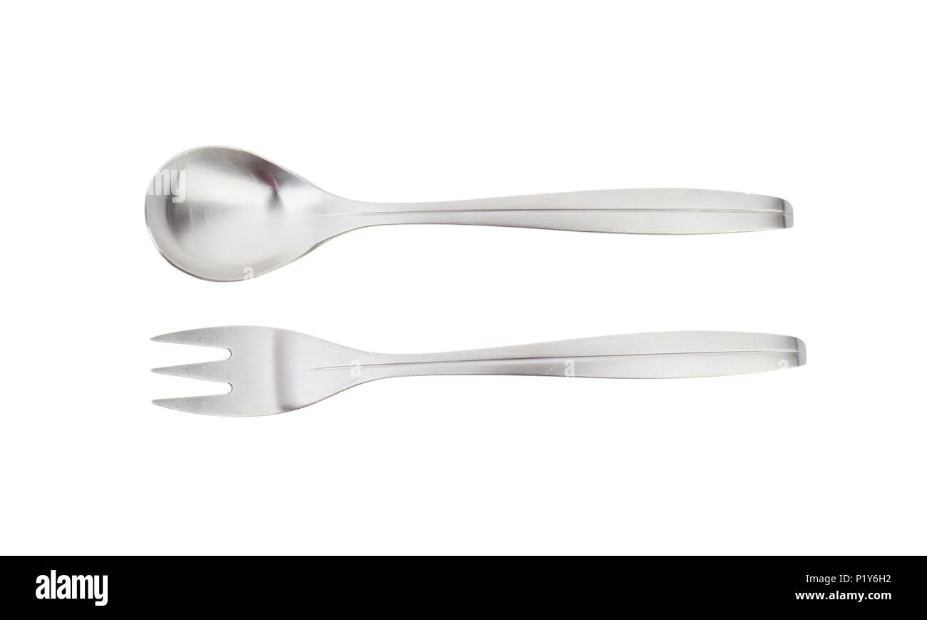 Metal spoon and three-pronged fork Stock Photo - Alamy