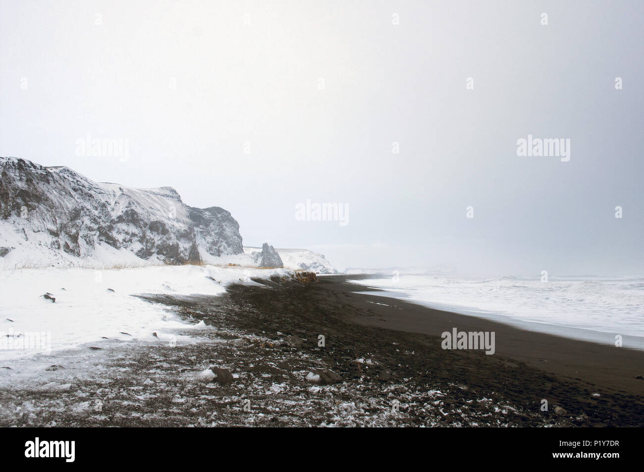 A dramatic view of the Reynisfjara Black Sand Beach in Vik, South ...
