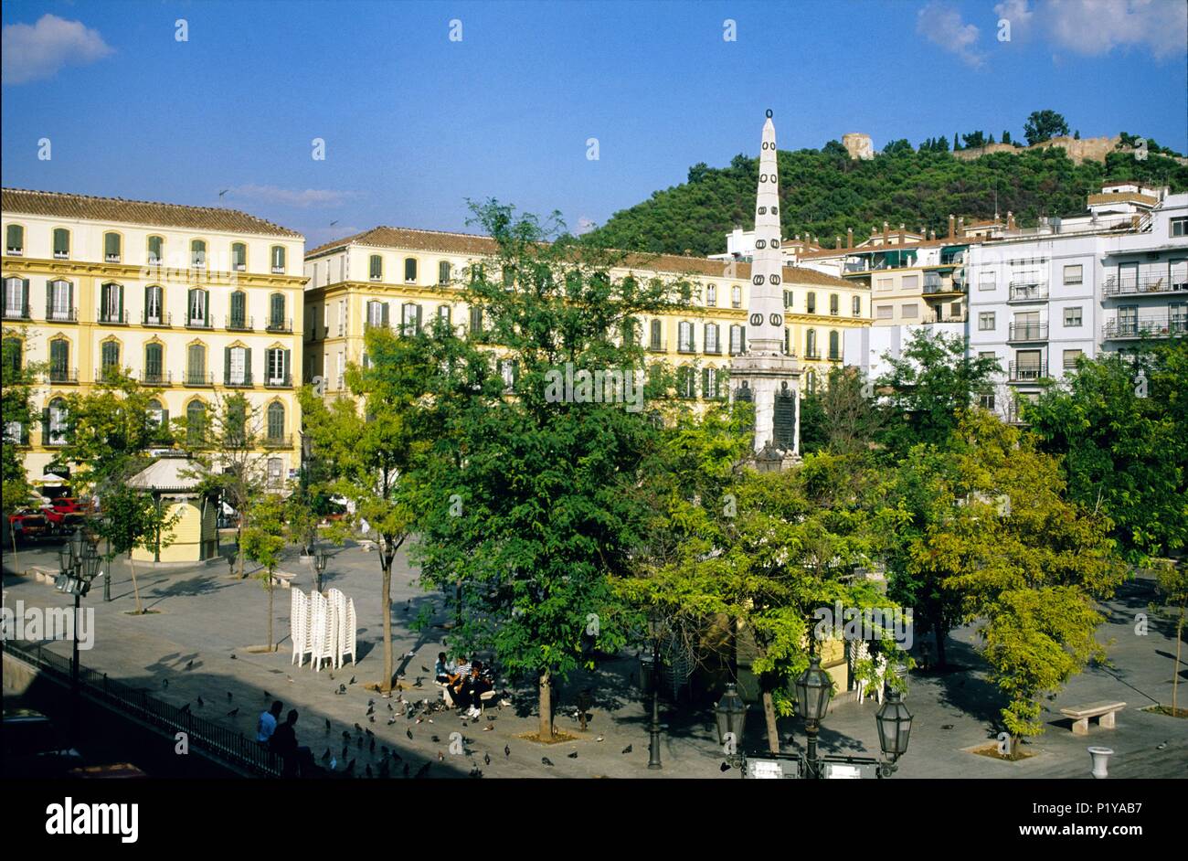 Merced square, with Picasso´s birthhouse; at the back, La Alcazaba ...