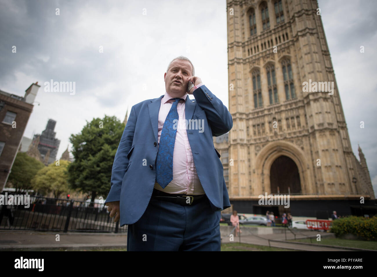 SNP Westminster leader Ian Blackford, on the phone, after he was kicked ...