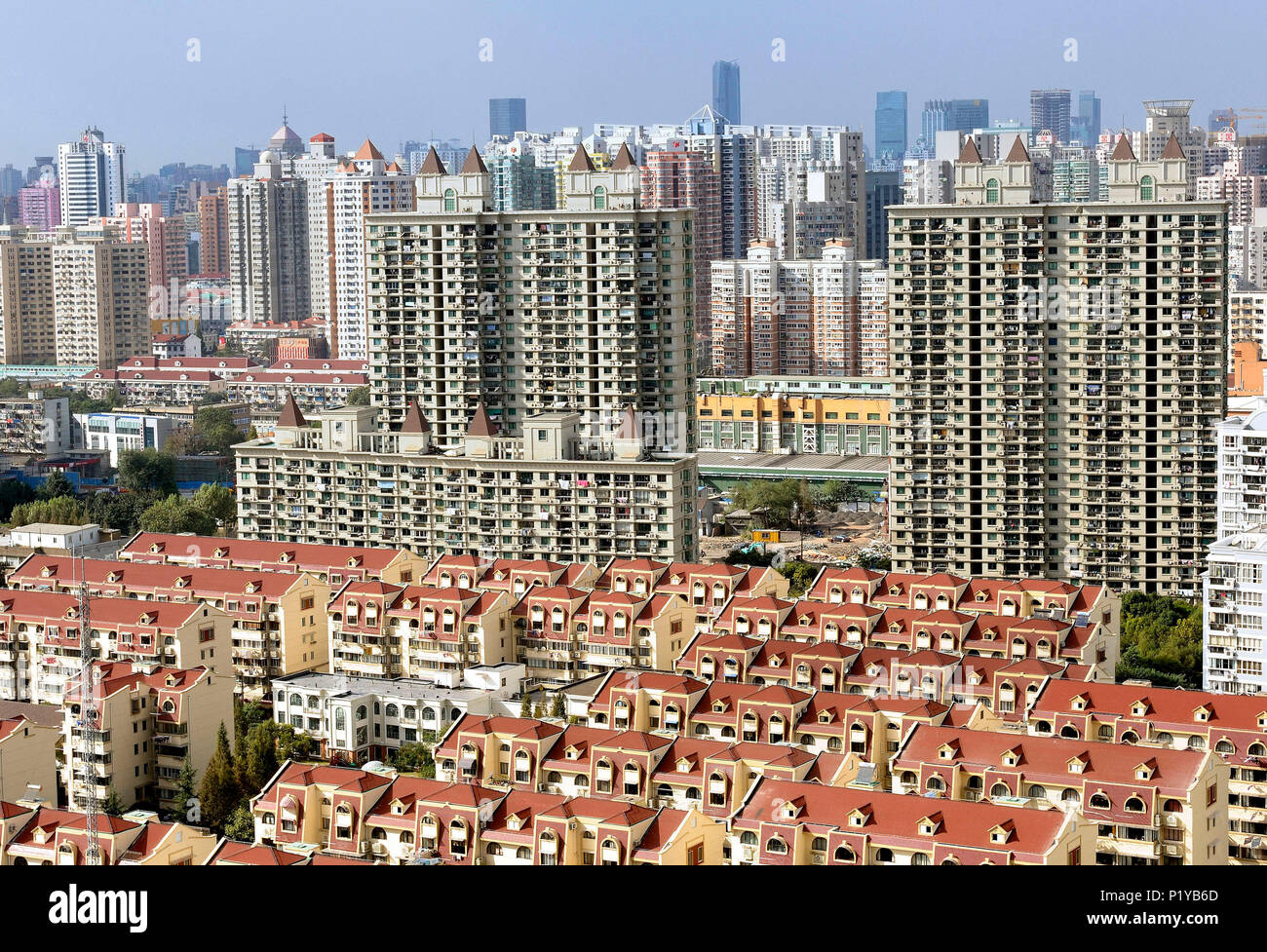China, Shanghai, Luwan district, towers and small residential buildings ...