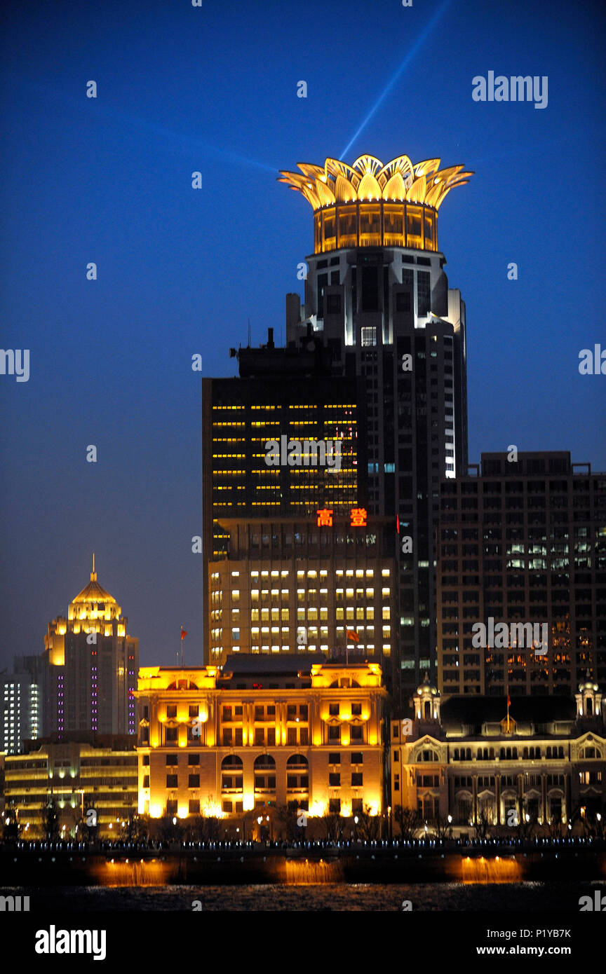 China, Shanghai, illuminated colonial buildings along the Huangpou ...