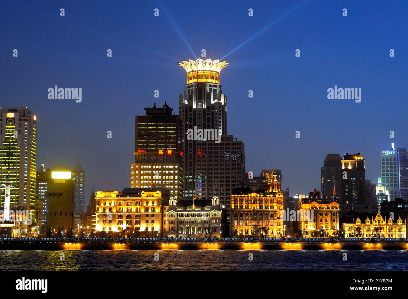 China, Shanghai, illuminated colonial buildings along the Huangpou ...