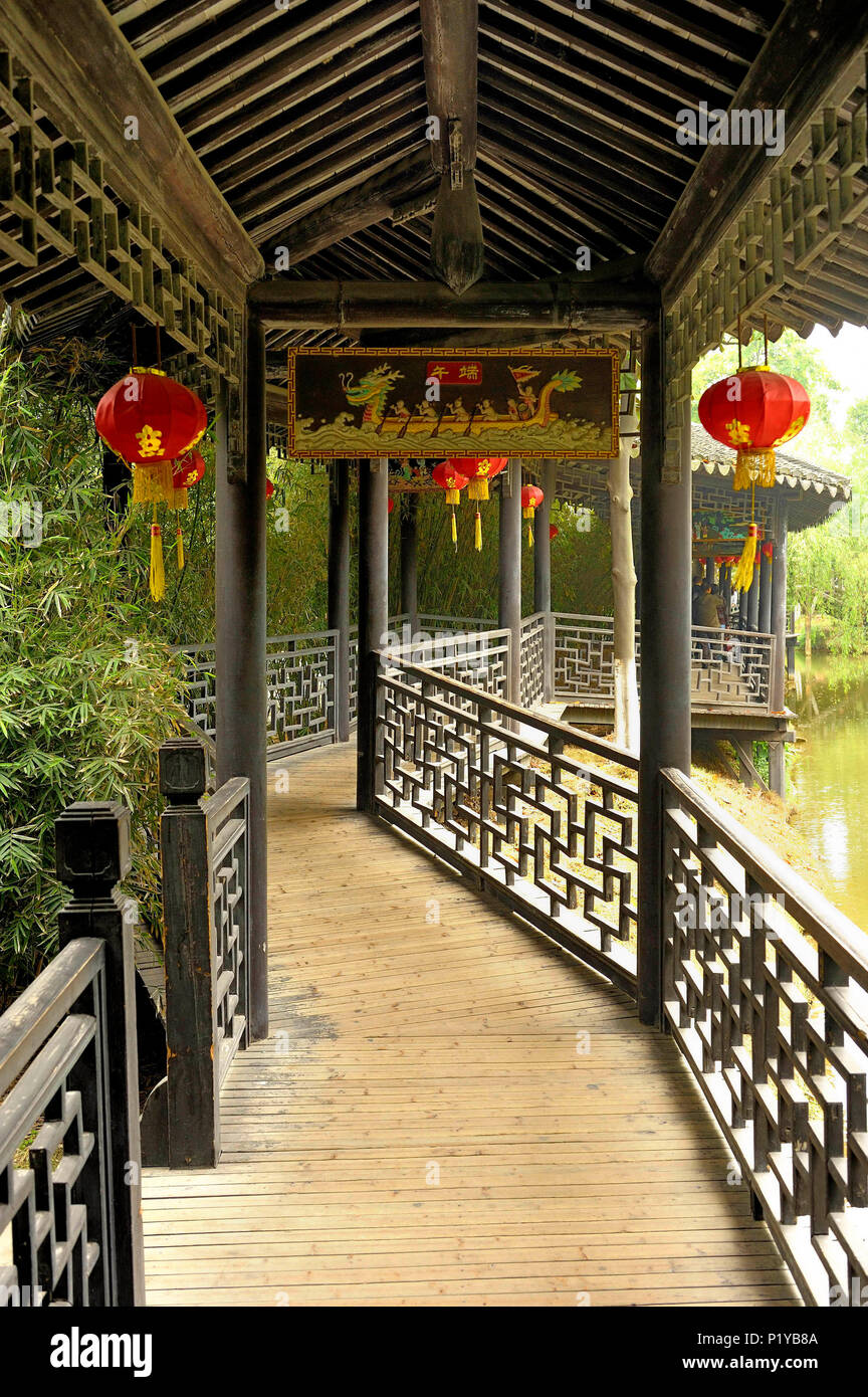 China, Jiangsu, Suzhou, wooden covered bridge in one of the Classical ...
