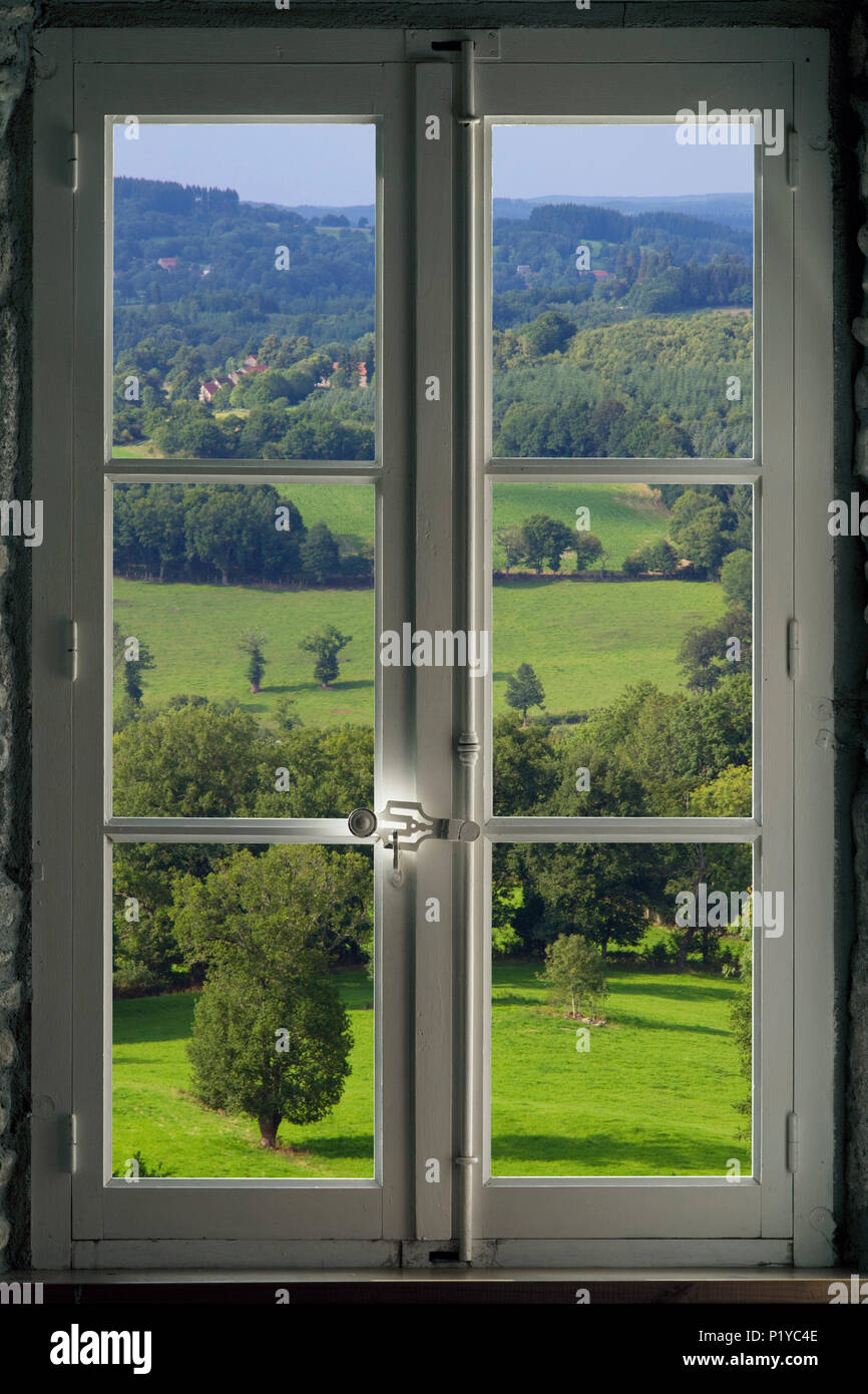 A green landscape seen through a window, (photomontage Stock Photo - Alamy