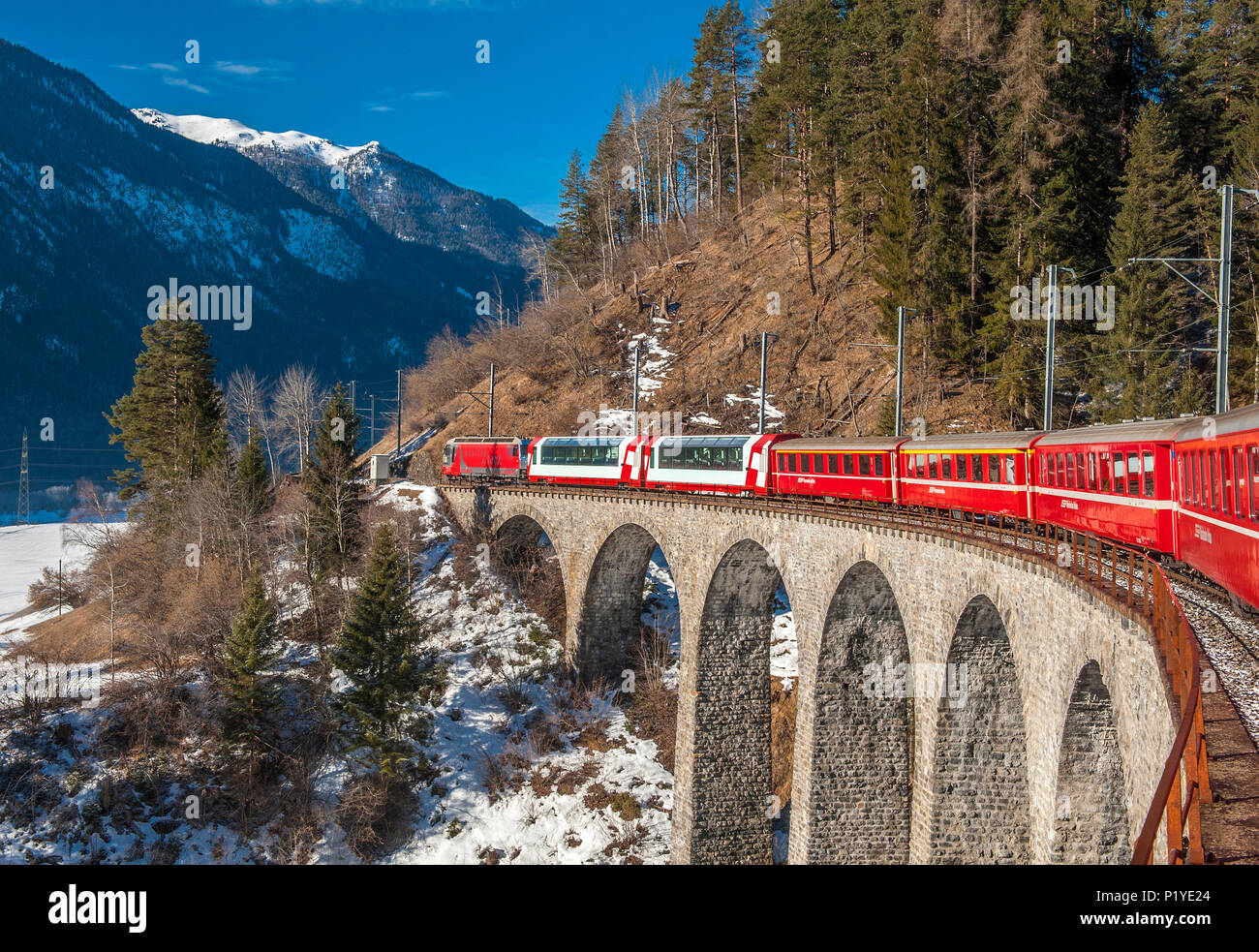 Switzerland, Albula Valley, viaduct and a Bernina Express train Stock ...