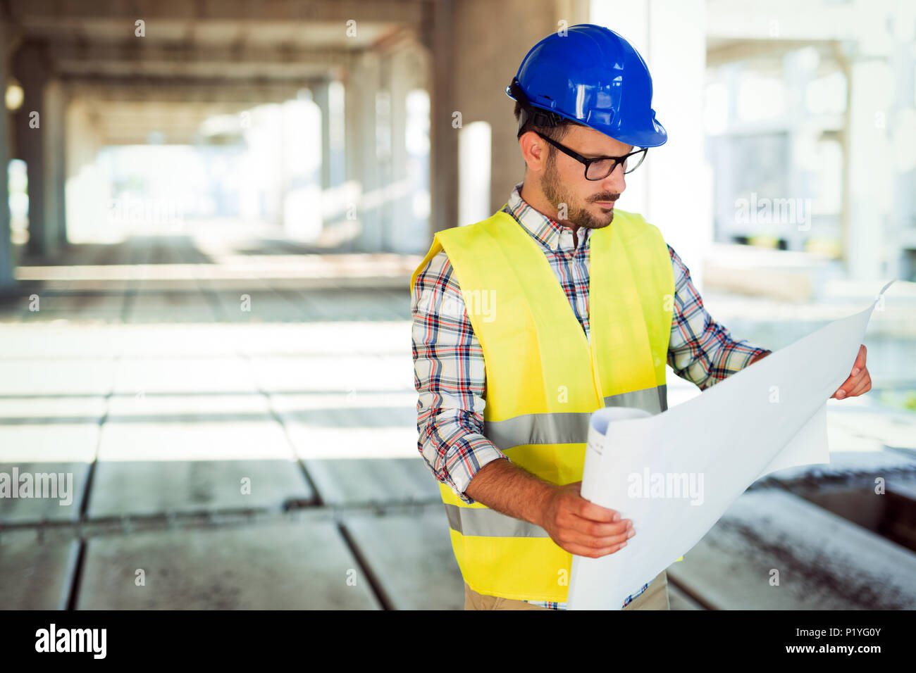 Young business man construction site engineer Stock Photo - Alamy