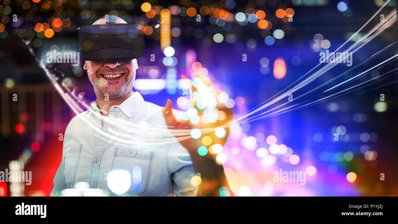 Composite image of man using an oculus Stock Photo - Alamy