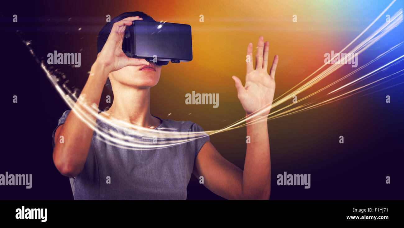 Young woman wearing virtual video glasses Stock Photo - Alamy