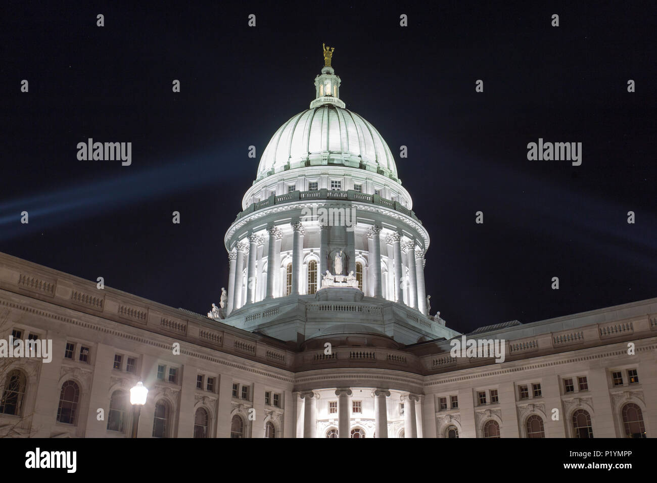 Dome of the Wisconsin State Capitol Building lit up at night in Madison ...