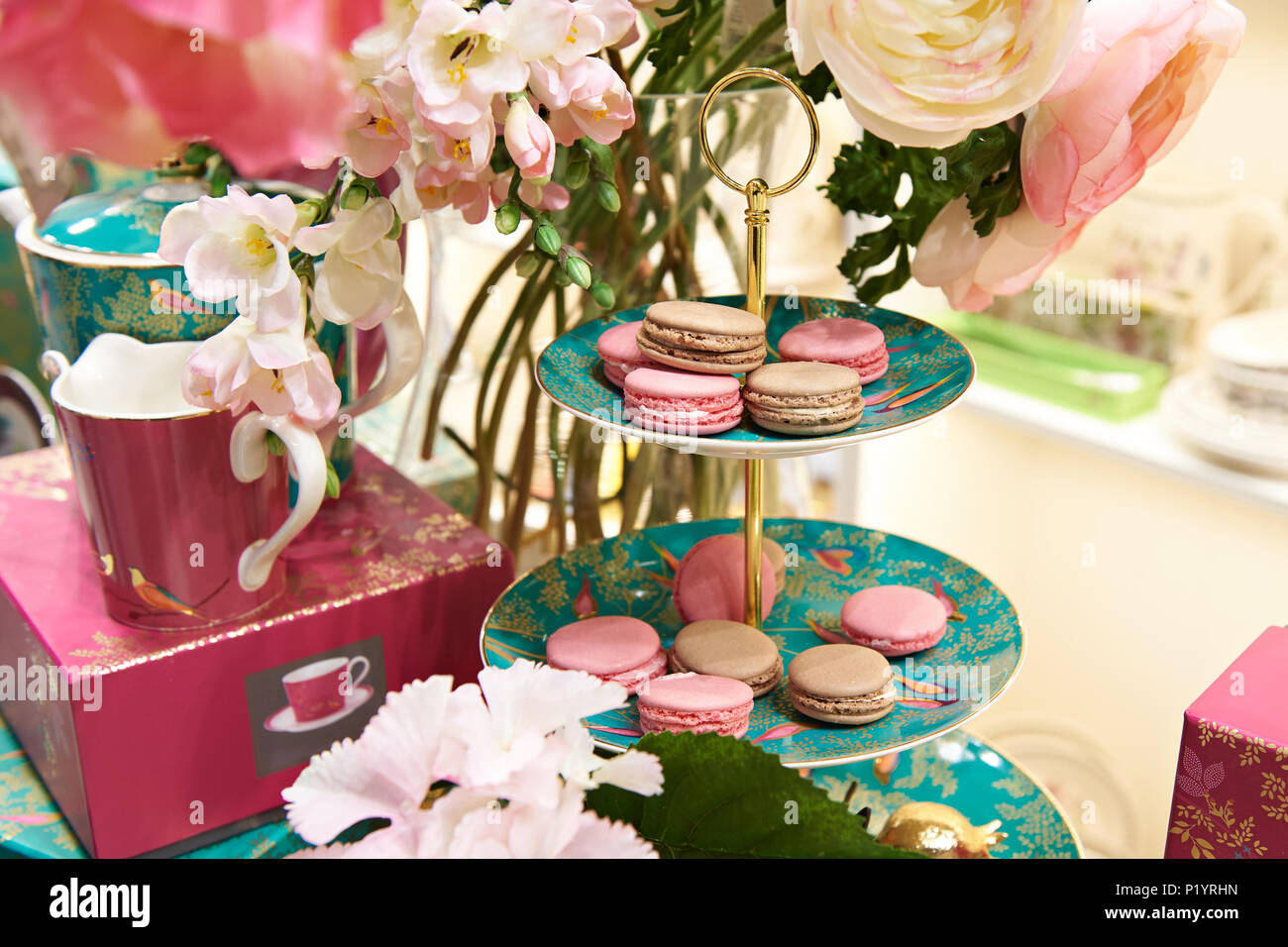Beautiful still life with macaron biscuits and flowers Stock Photo - Alamy
