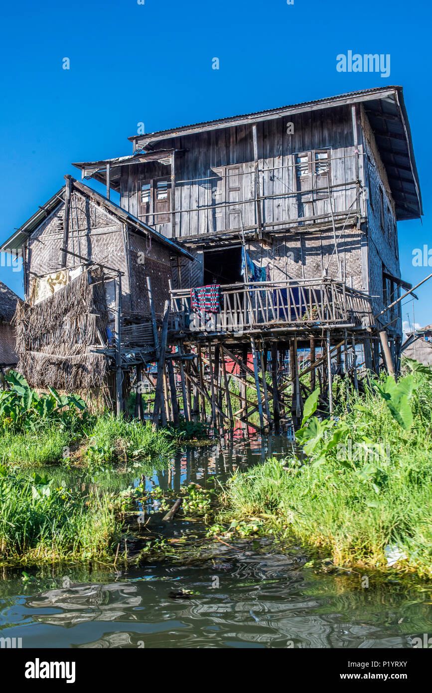 Myanmar, Shan region, lake Inle, wood house on stilts in the middle of ...