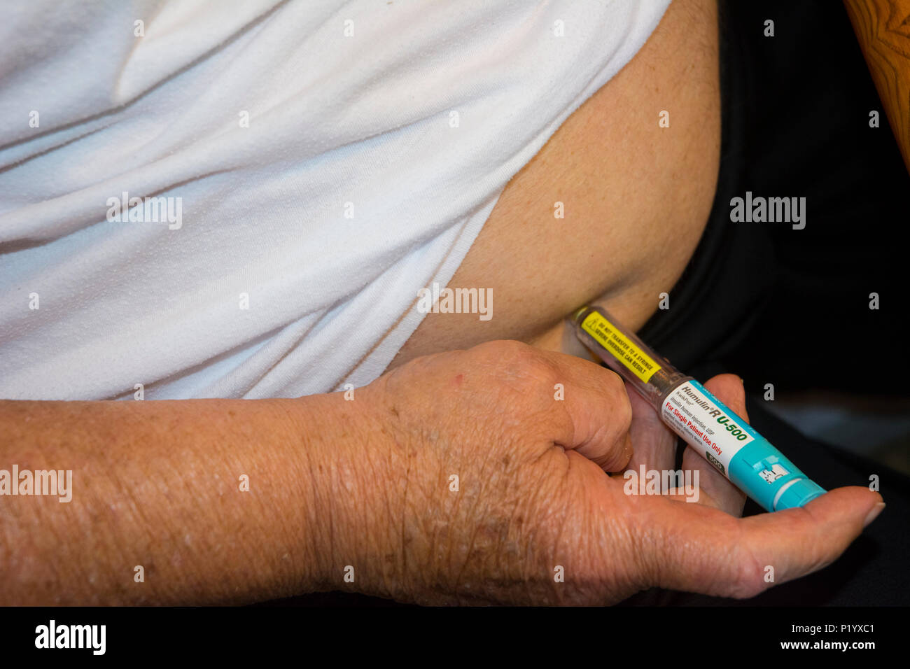 Shot into Stomach Done twice a day Stock Photo - Alamy