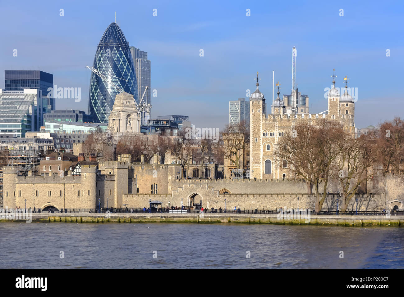 Old and New - historic Tower of London castle next to modern glass and ...