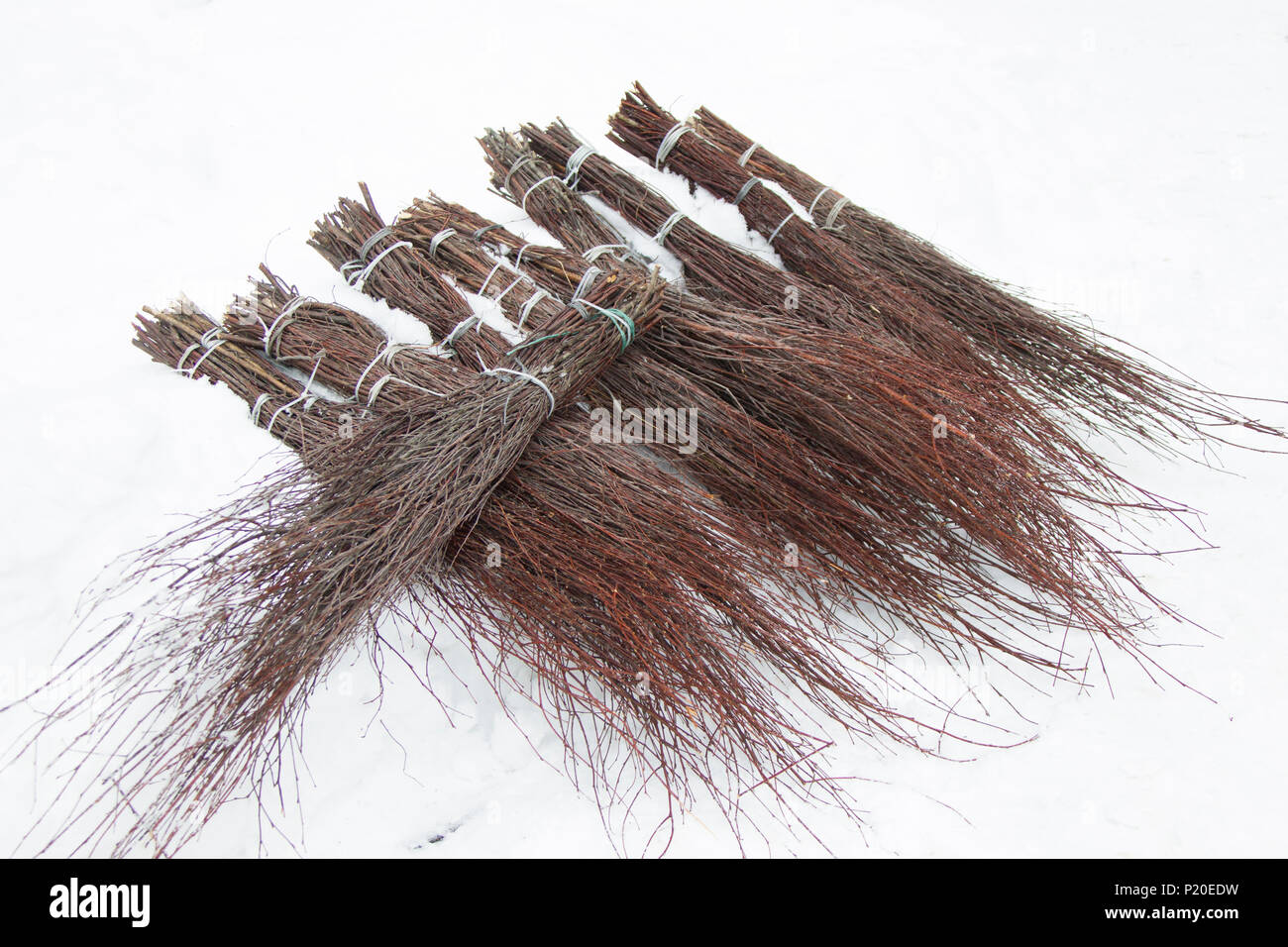 Many brooms from dry tree branches.Besom Stock Photo - Alamy